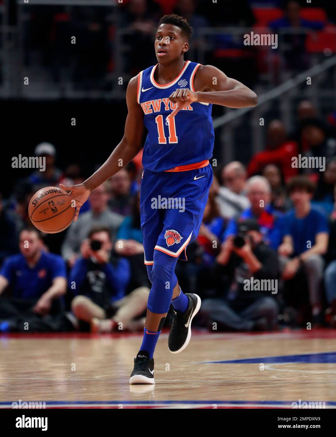 New York Knicks guard Frank Ntilikina (11) brings the ball up court ...