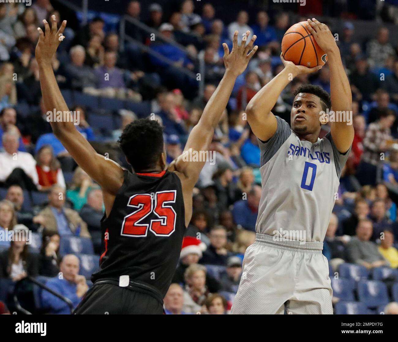 Saint Louis' Jordan Goodwin (0) shoots over Southeast Missouri State's ...