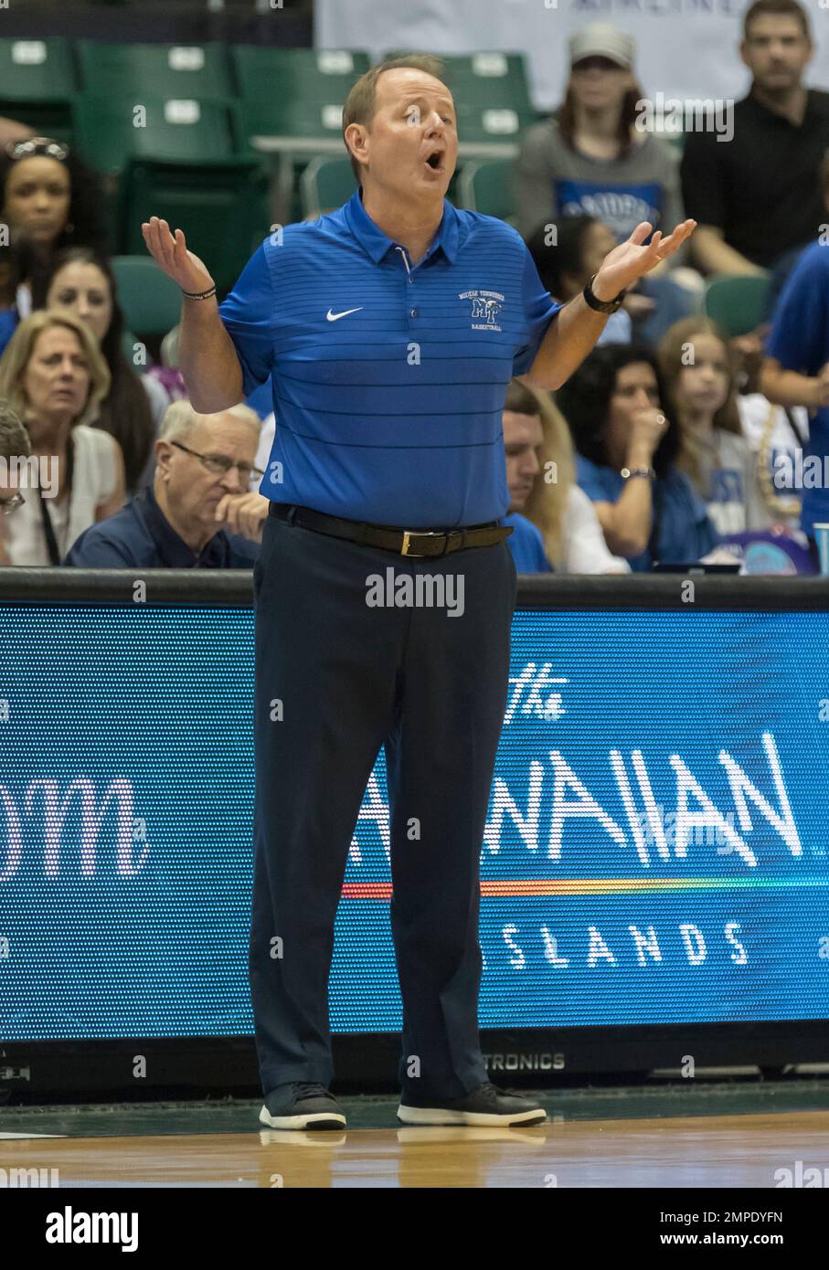 Middle Tennessee coach Kermit Davis argues a call with a game official ...