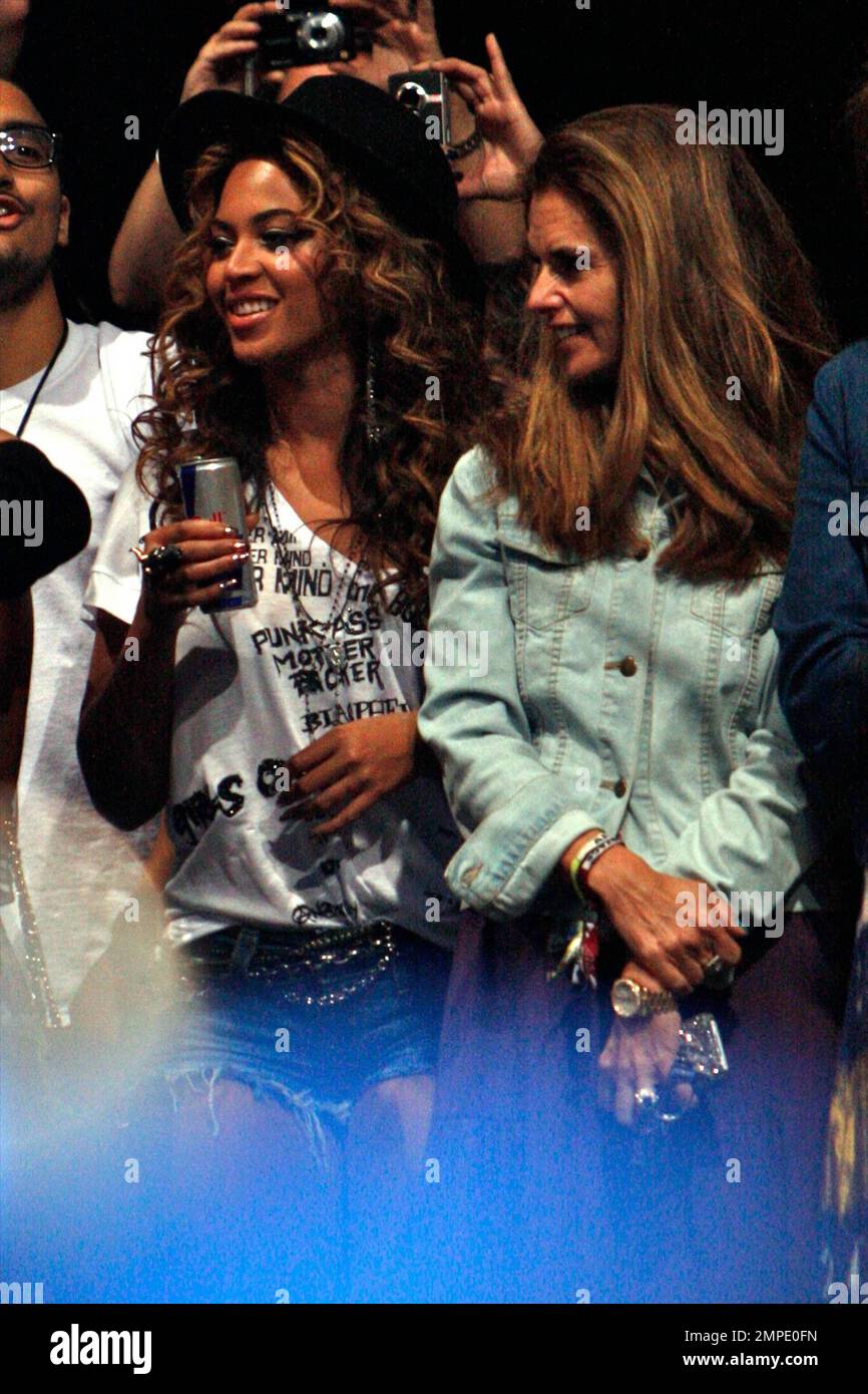 Beyonce drinks a can of red bull wearing skimpy jean shorts next to ...