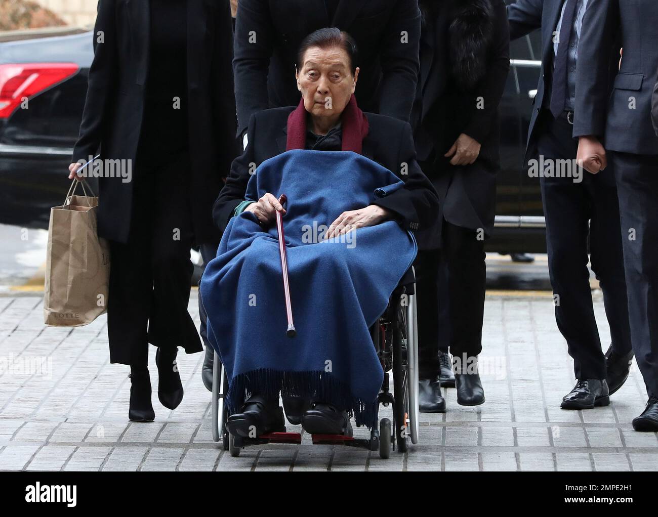 Lotte Group Founder Shin Kyuk-ho in a wheelchair, arrives at the ...