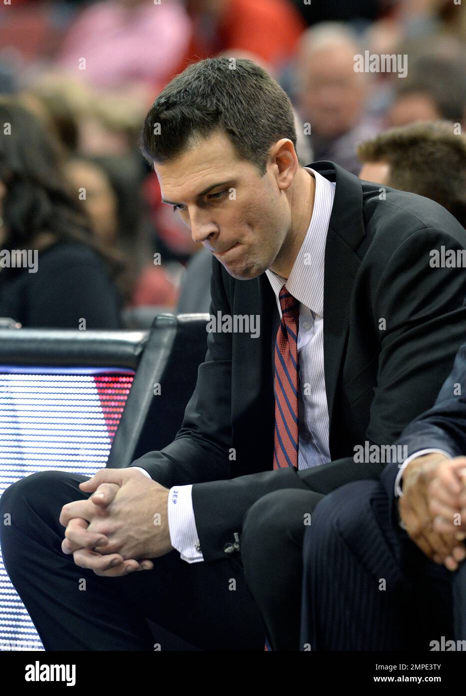 Louisville interim head coach David Padgett reacts to his teams play ...
