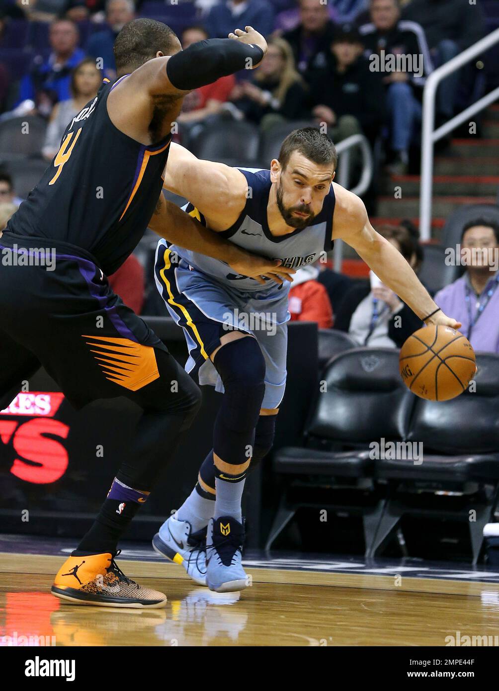 Memphis Grizzlies center Marc Gasol, right, drives to the basket past ...