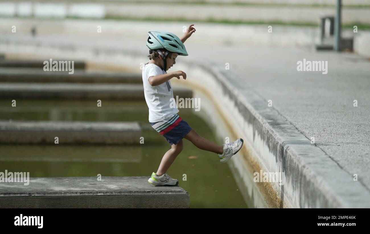 Child stuck on platform at lake unable to reach floor outside at park ...