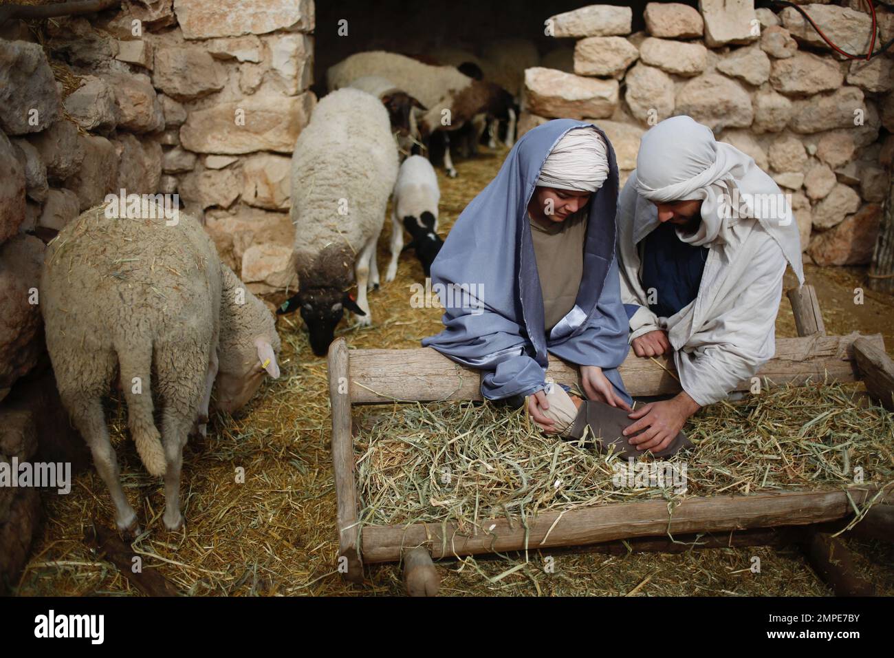 Christian actors portray Joseph and Mary during a re-enactment of a ...