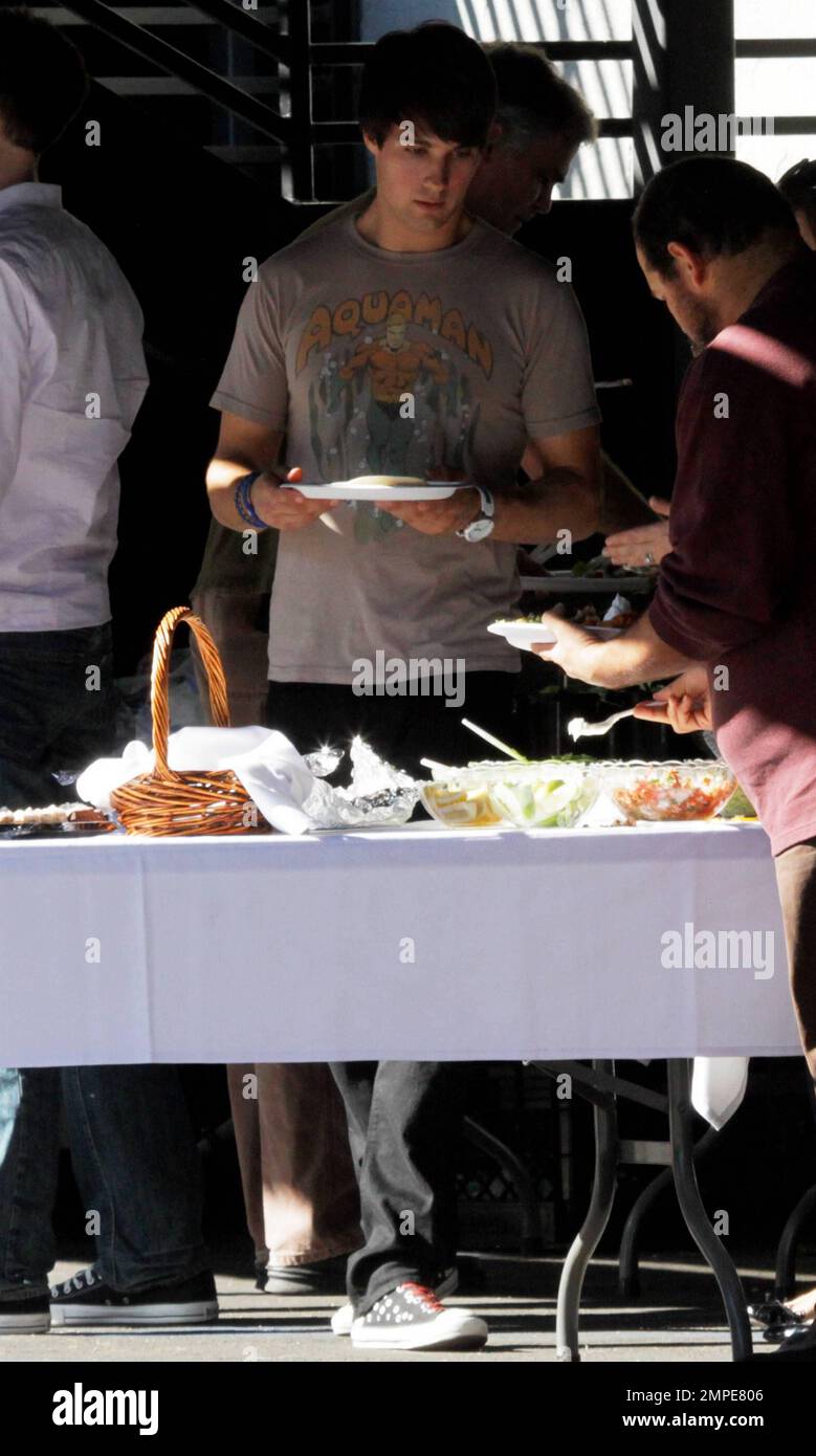 Singer James Maslow of 'Big Time Rush' serving himself lunch at a sound ...