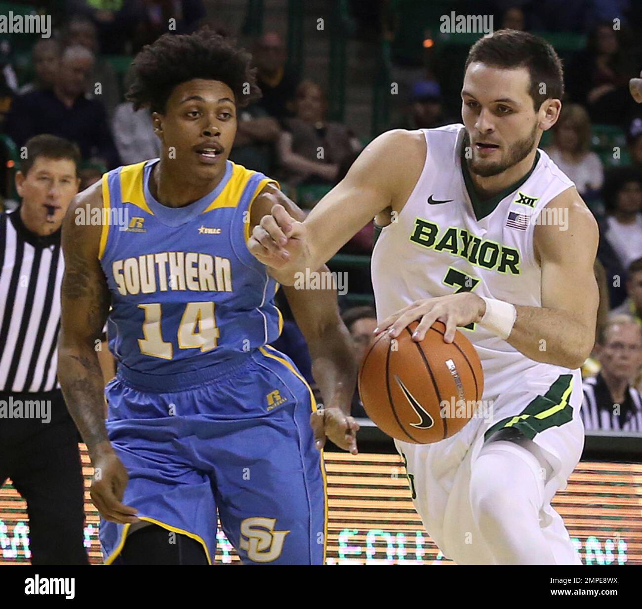 Baylor guard Jake Lindsey (3) takes the ball up court against Southern ...