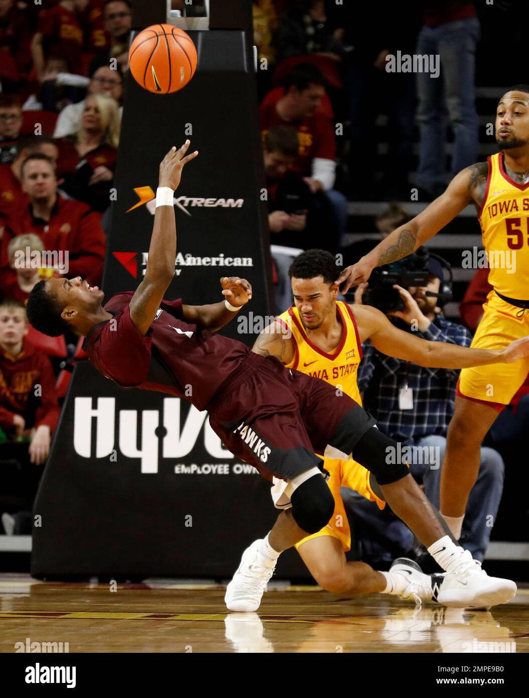 Maryland-Eastern Shore forward Miryne Thomas, left, is fouled by Iowa ...