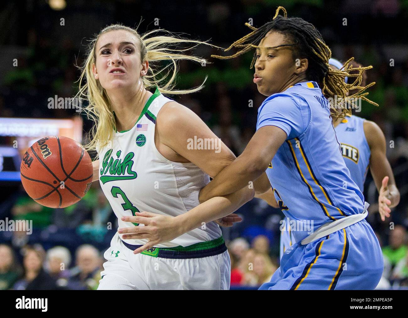 Notre Dame's Marina Mabrey (3) tries to move by Marquette's Amani ...