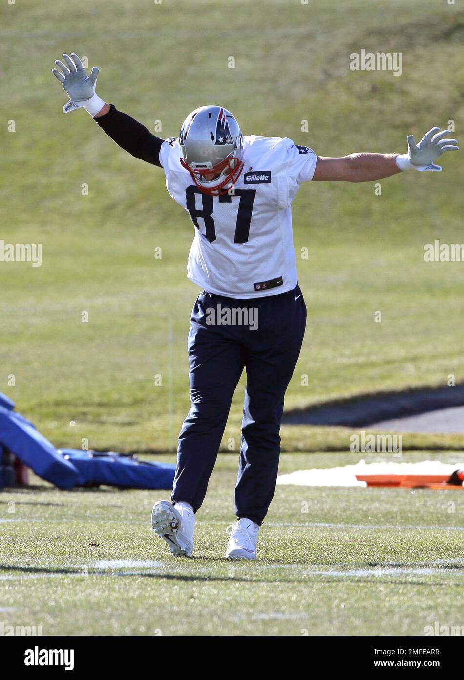 New England Patriots tight end Rob Gronkowski (87) stretches while ...