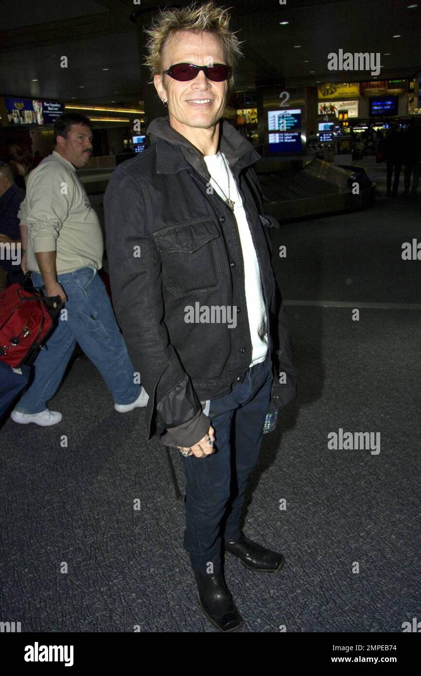Exclusive!! Rocker Billy Idol arrives at McCarran International Airport ...