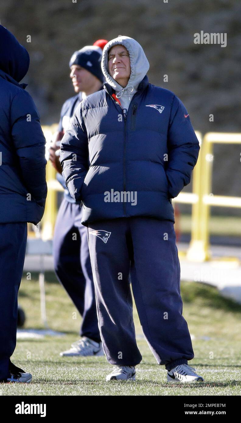 New England Patriots head coach Bill Belichick stands on the field ...