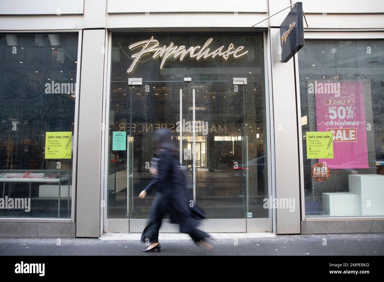 LONDON, 31st January 2023, A person walks past a closed down Paperchase ...