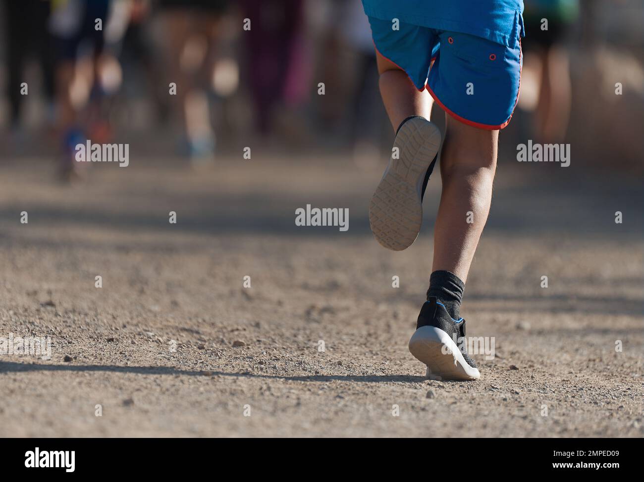 Running children, young athletes run in a kids run race,running on city ...