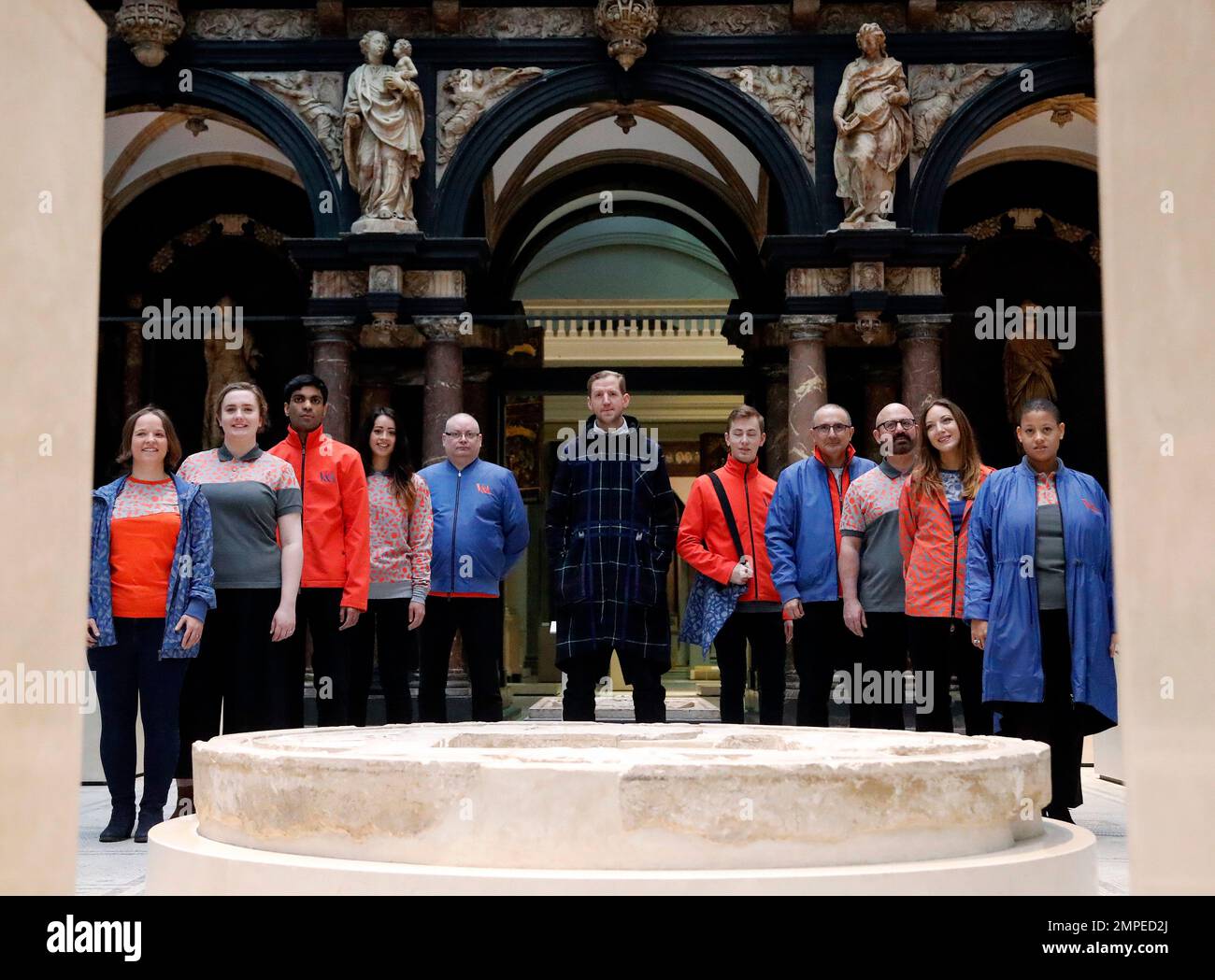 Victoria and Albert Museum staff display their new uniforms in London ...