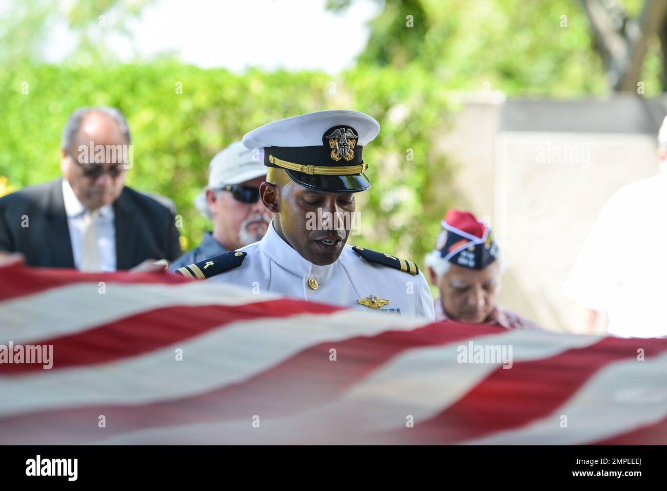A U.S. Navy chaplain speaks during an internment ceremony for U.S. Navy ...
