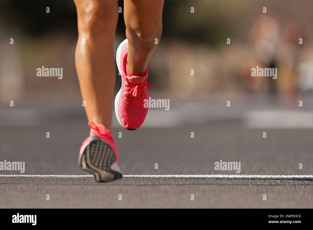 Runner feet running on road hi-res stock photography and images - Alamy