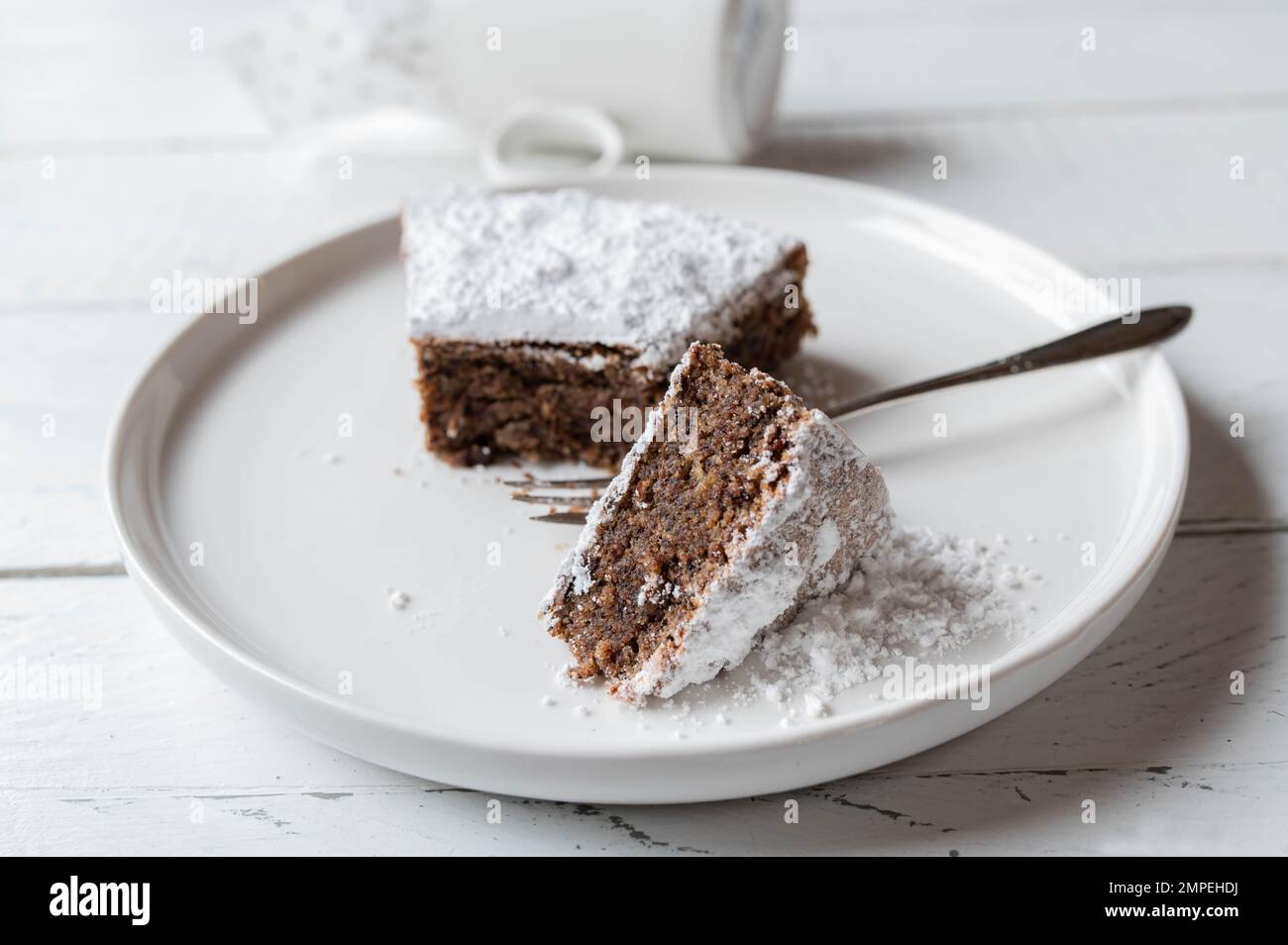 Italian chocolate, almond cake, torta caprese served sliced on a white ...