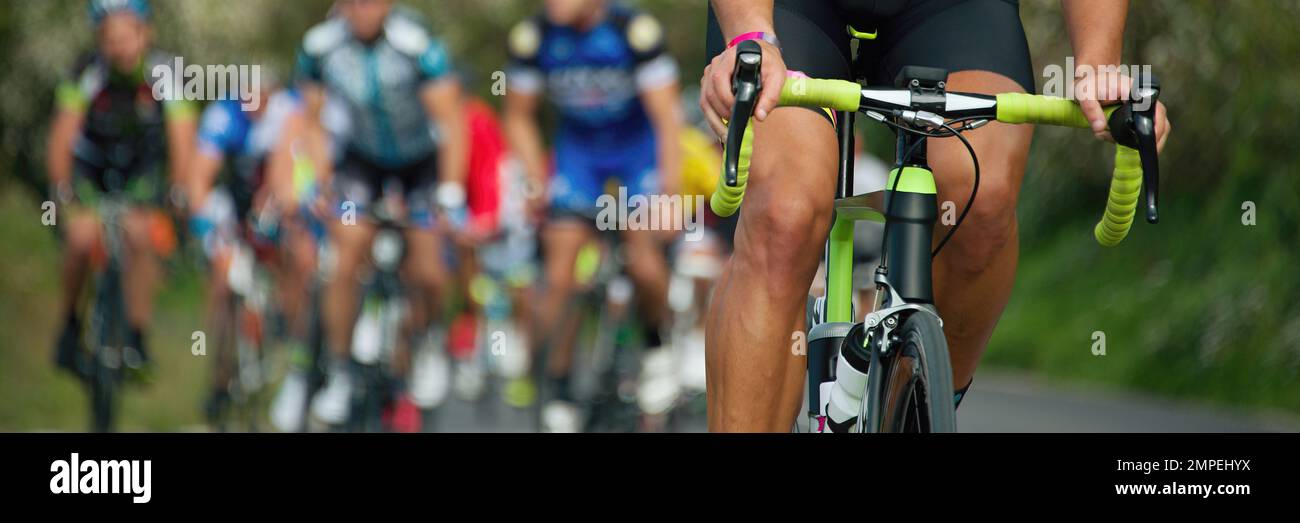 Cycling competition, cyclist athletes riding a race Stock Photo - Alamy