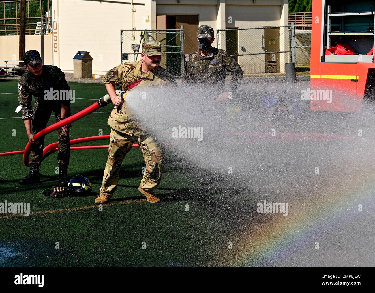 Tech. Sgt. Bradley Baker, 8th Civil Engineer Squadron firefighter, uses ...