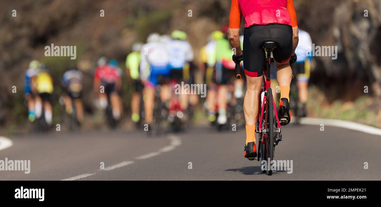 Cycling competition cyclist athletes riding a race at high speed ...
