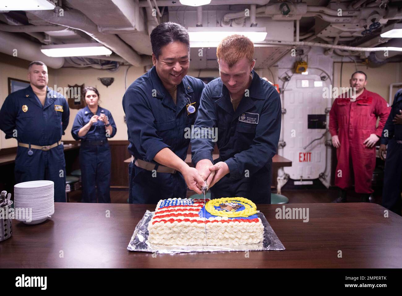 221013-N-LK647-1148 ATLANTIC OCEAN—Lt. Juntae Park, chaplain, center ...