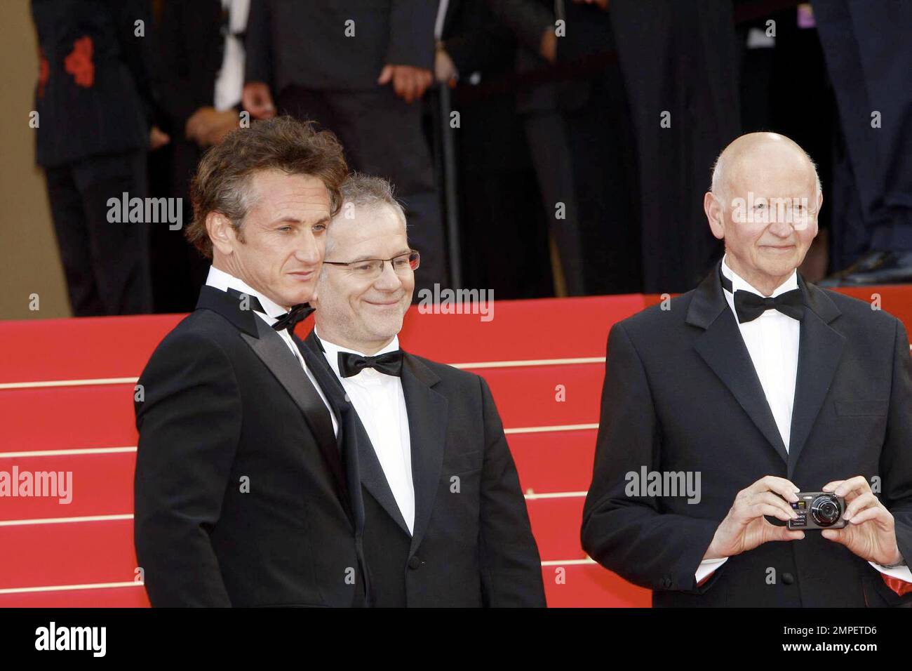 Sean Penn and president of the Cannes Film Festival Gilles Jacob walk ...