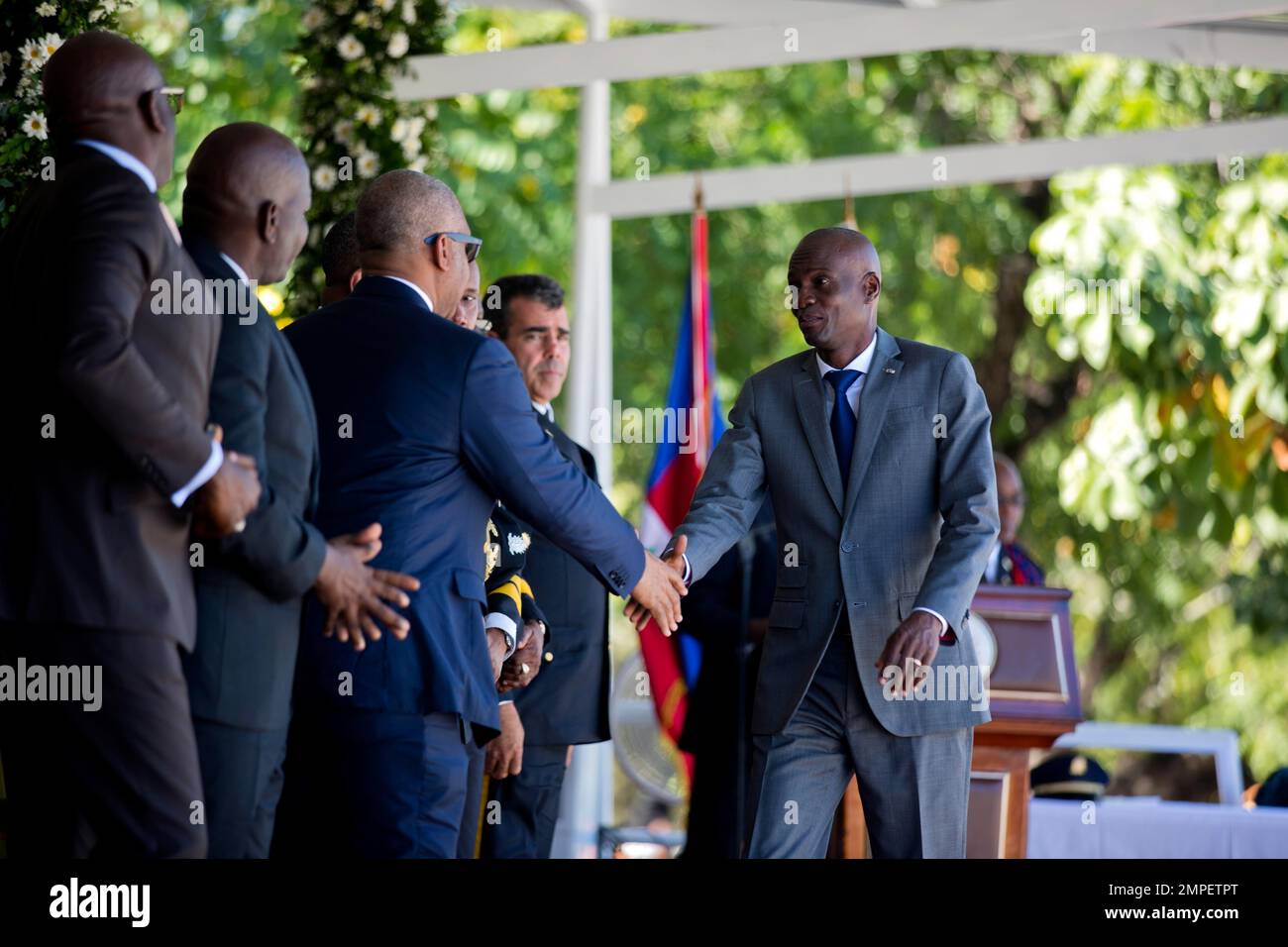 Haiti's President Jovenel Moise, right, greets Prime Minister Dr ...