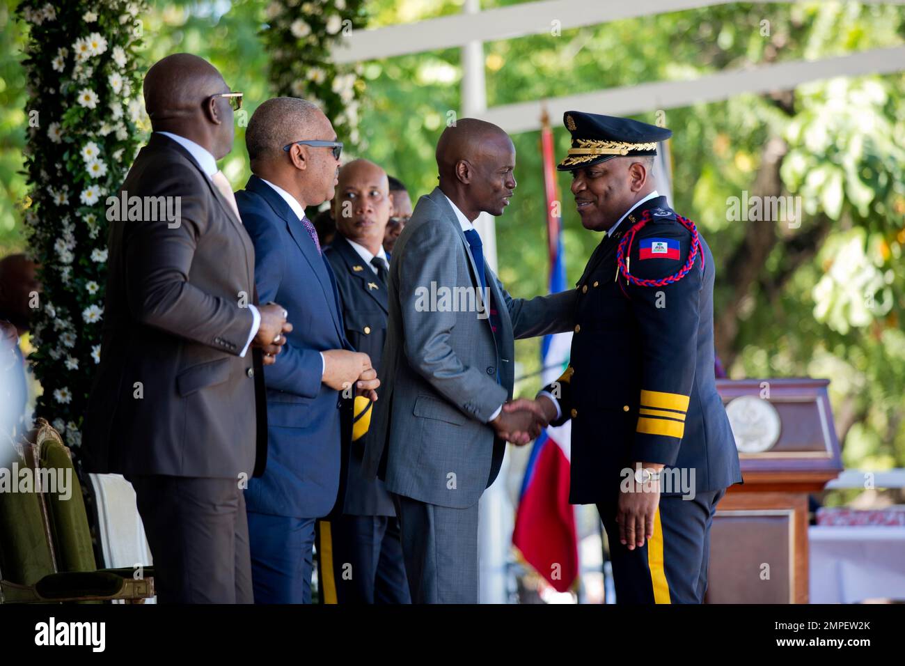 Haiti's President Jovenel Moise, center, greets Police Chief Michel ...