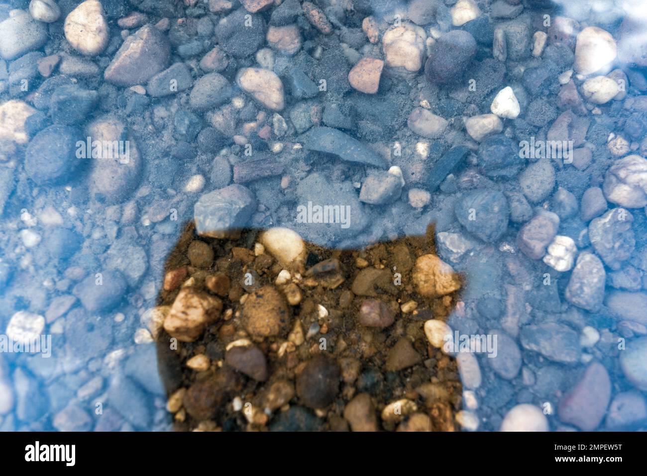 Abstract photo of a transparent water surface with reflections of light ...