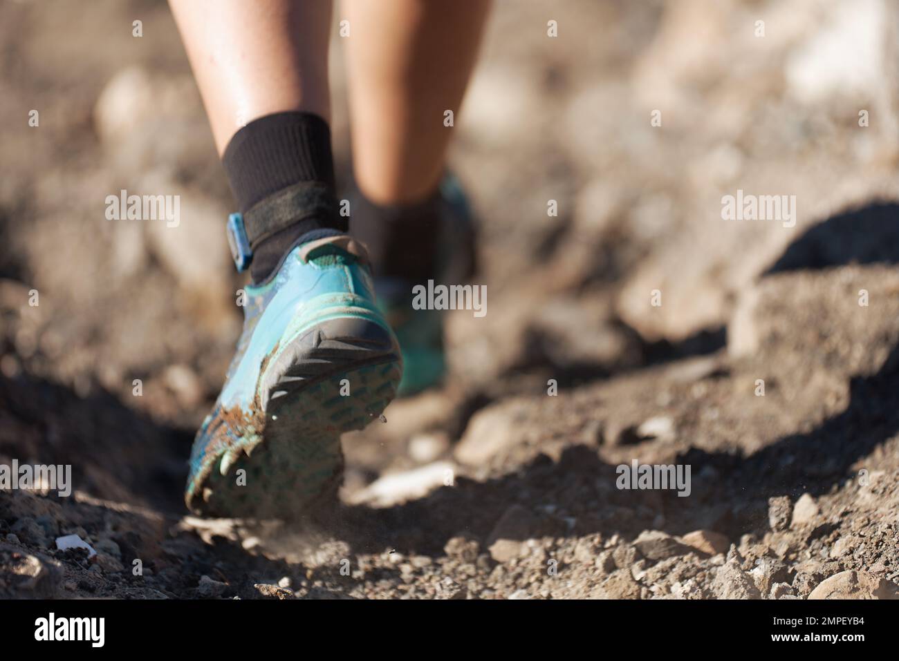 Trail running action close up of running shoes in action Stock Photo ...