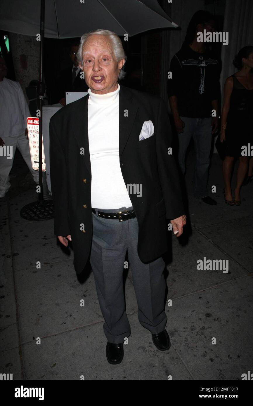 Former professional golfer Bob May poses for photos outside the ...