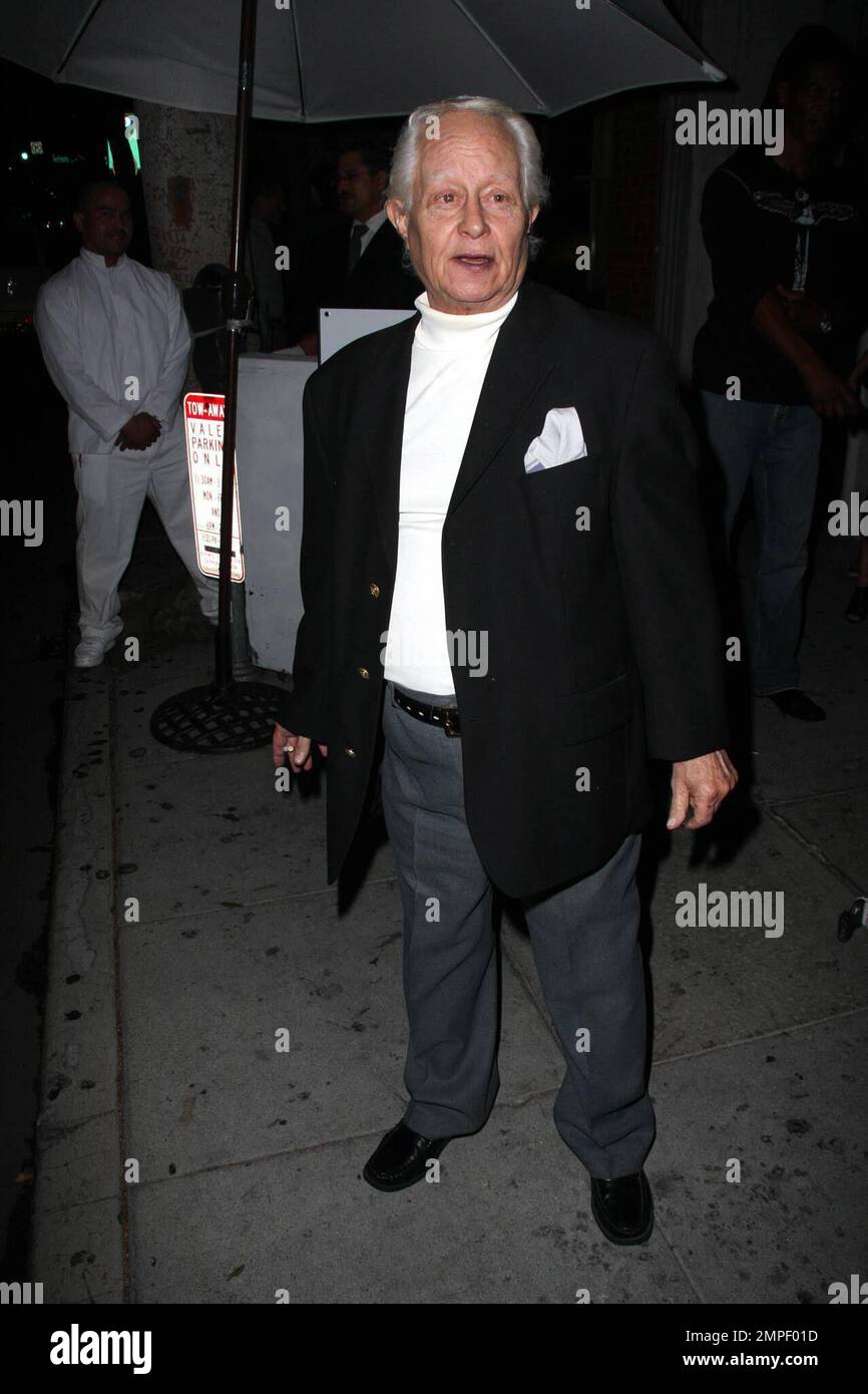 Former professional golfer Bob May poses for photos outside the ...