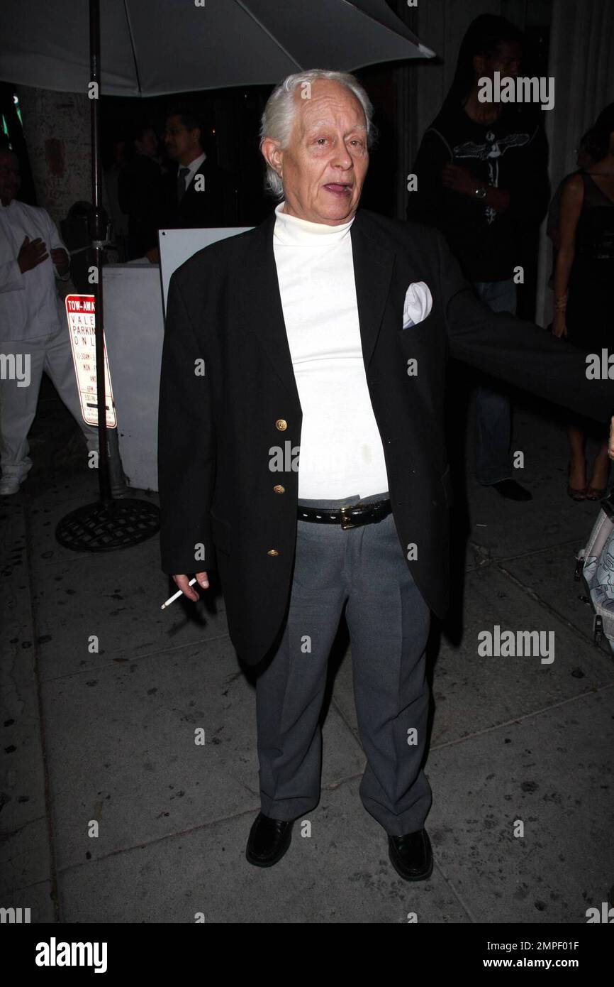 Former professional golfer Bob May poses for photos outside the ...