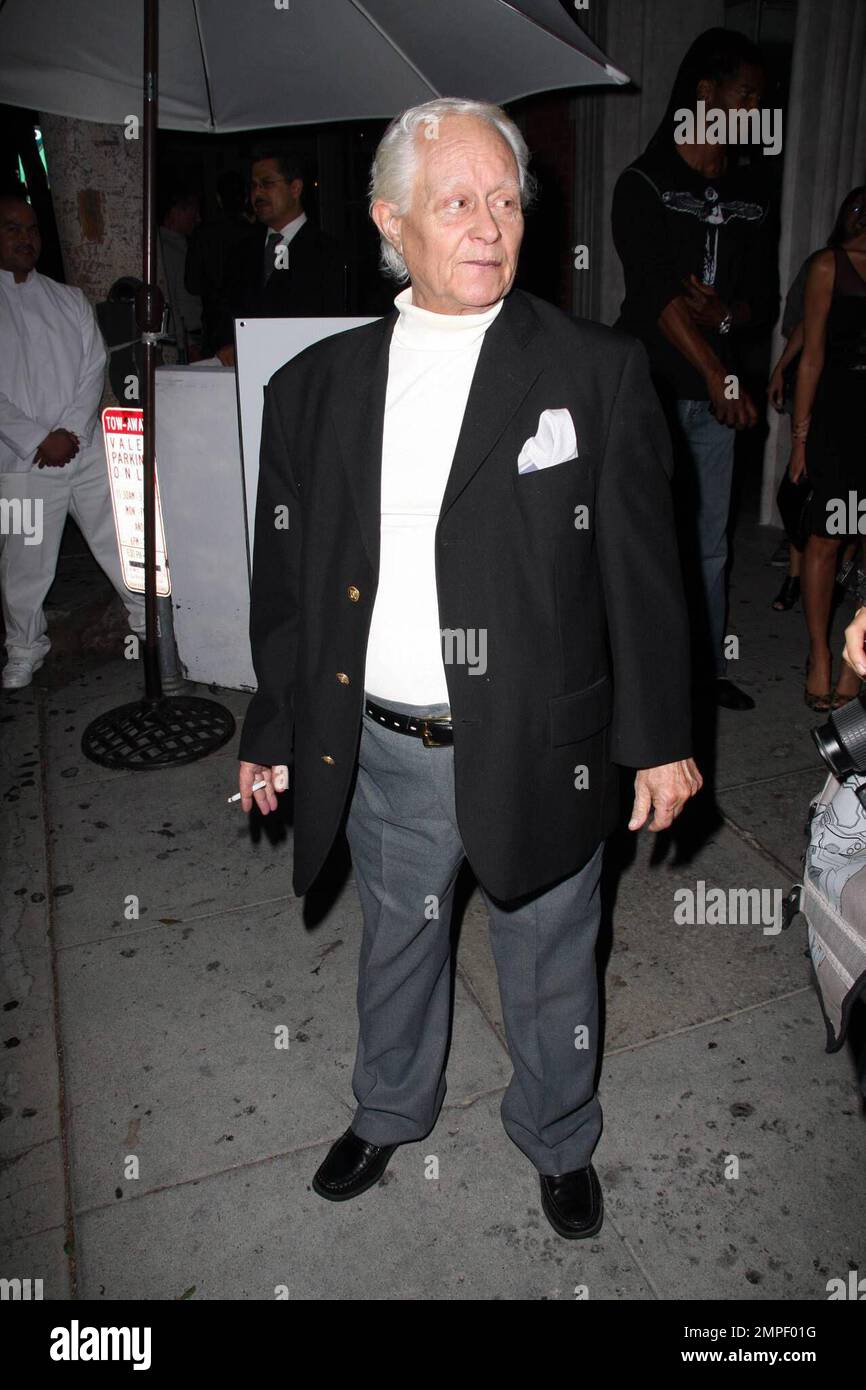 Former professional golfer Bob May poses for photos outside the ...