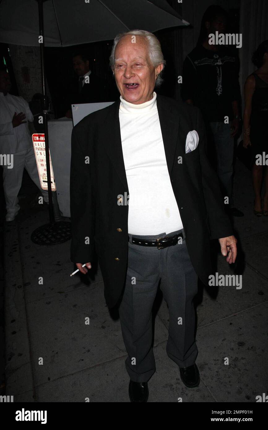 Former professional golfer Bob May poses for photos outside the ...