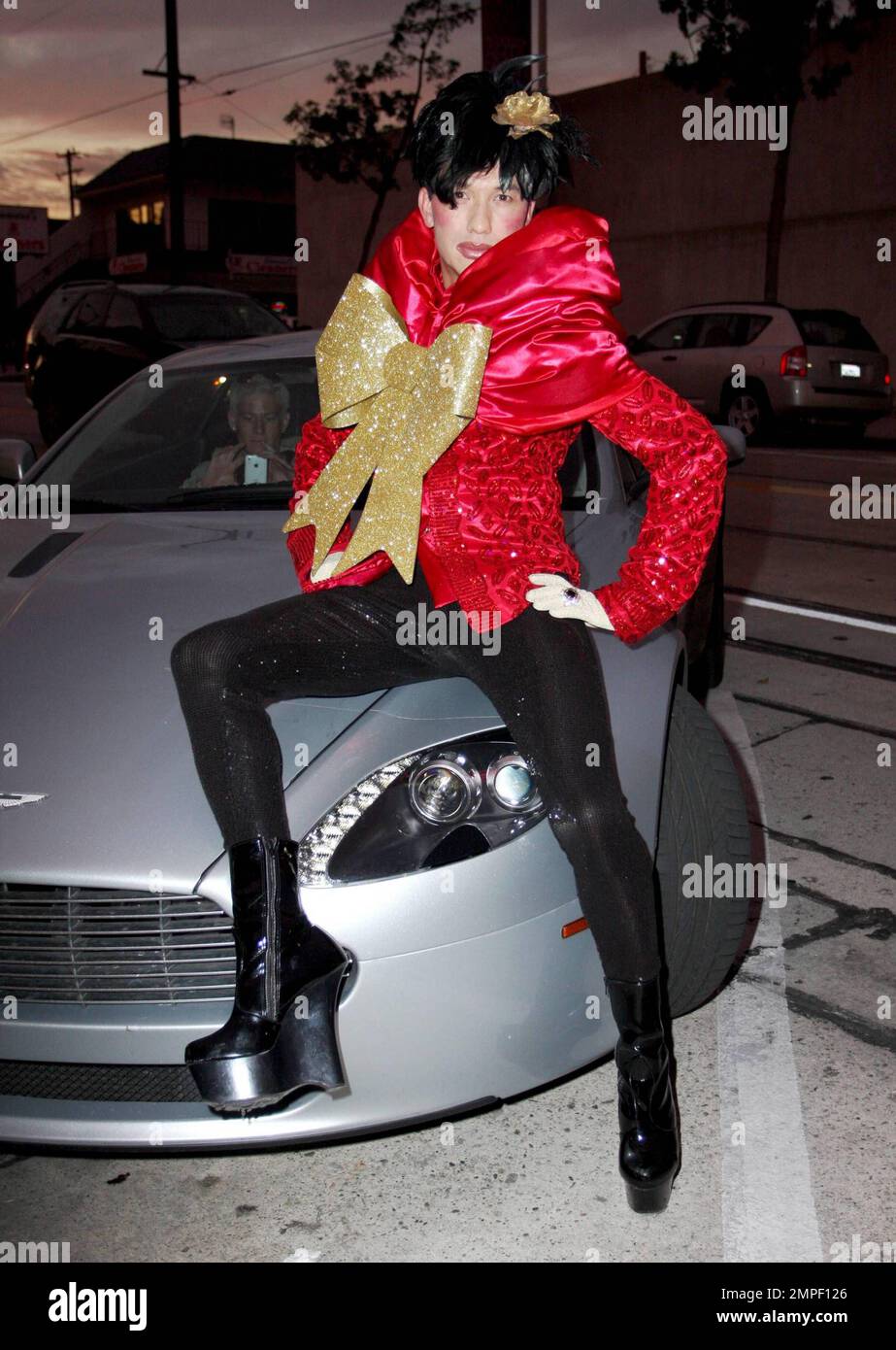 EXCLUSIVE!! Bobby Trendy poses in a very festive outfit near his store ...