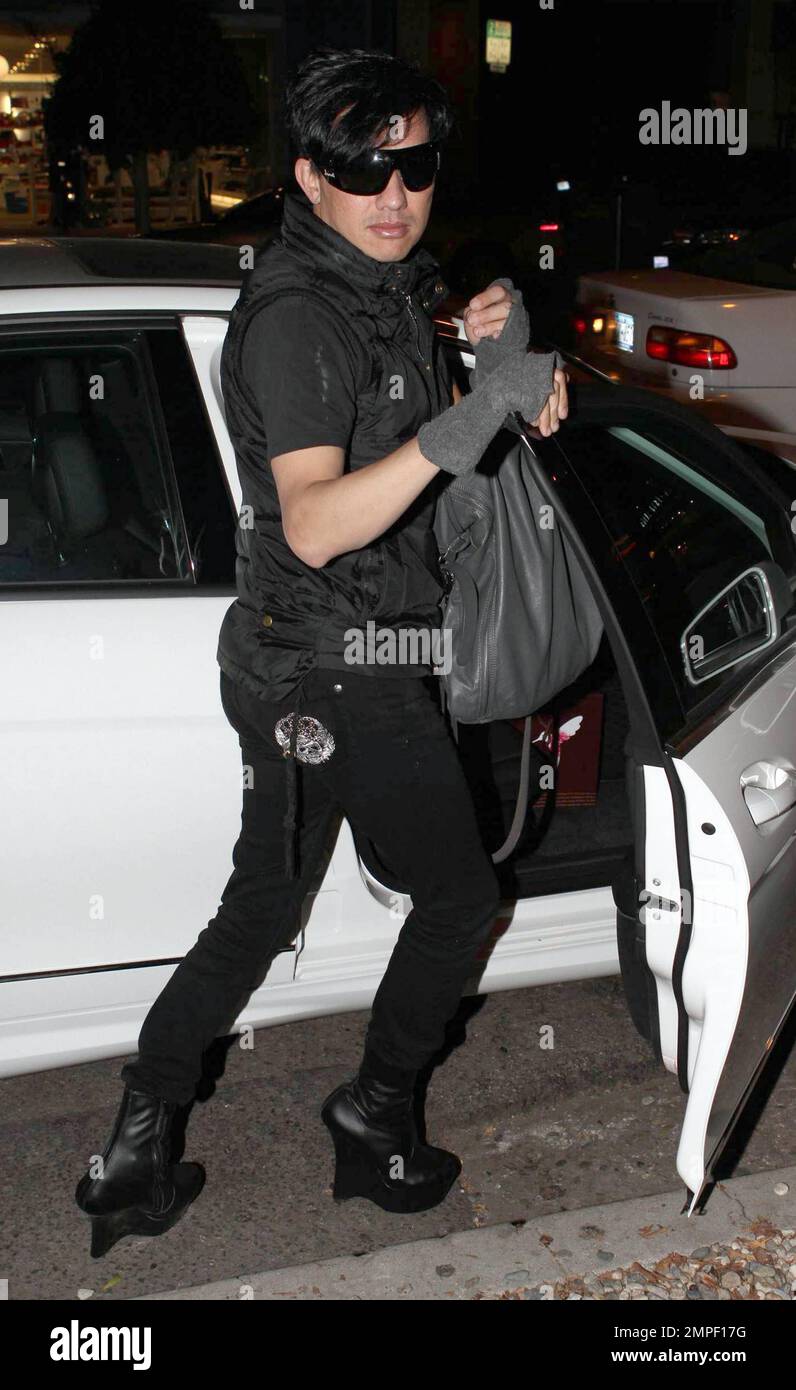 Fashion Designer Bobby Trendy strikes his usual poses in high heels as ...