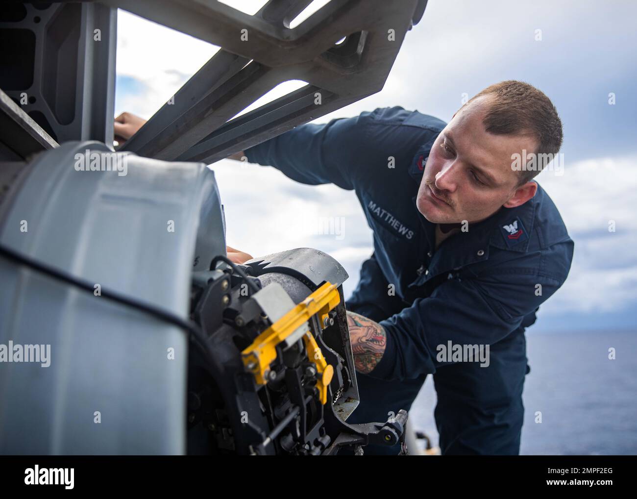 Fire Controlman 2nd Class Eric Matthews, assigned to the Arleigh Burke ...