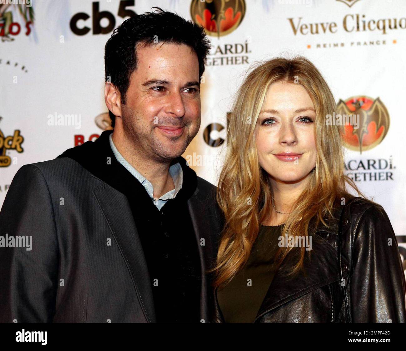 Actors Jonathan Silverman and wife Jennifer Finnegan attend the grand ...