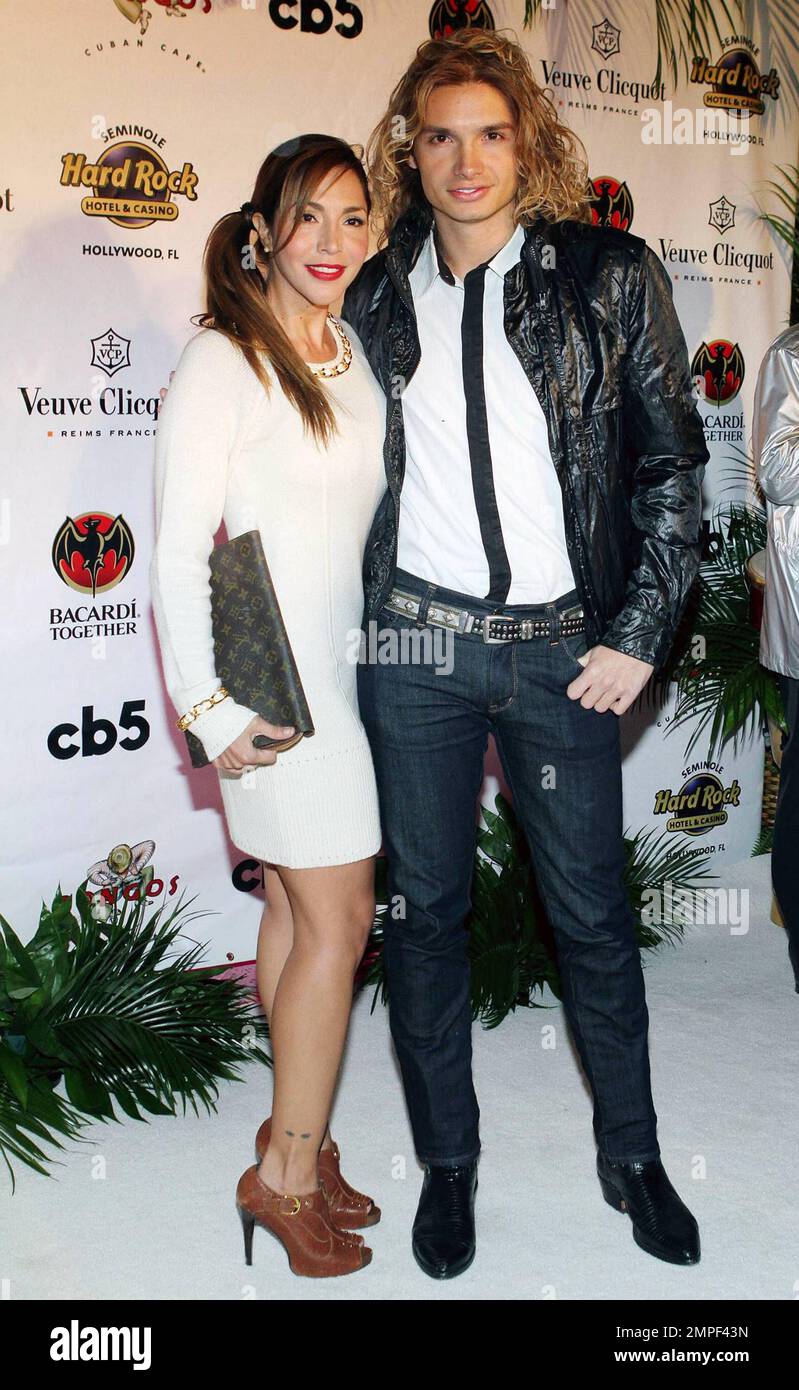Christian Acosta and guest attend the grand opening of Bongos Cuban ...