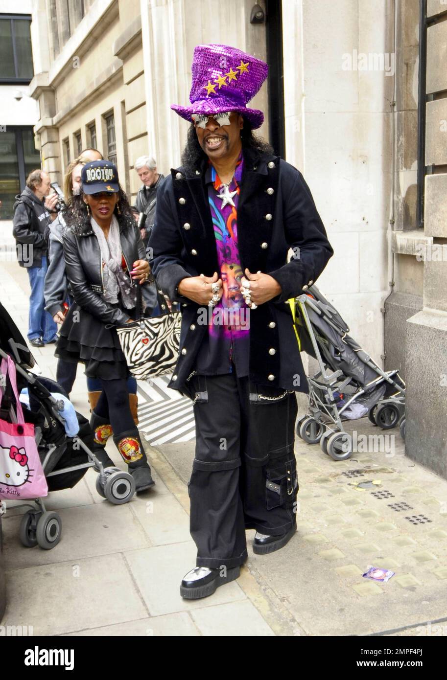 Always the flasy dresser, funk music legend Bootsy Collins wears a big ...