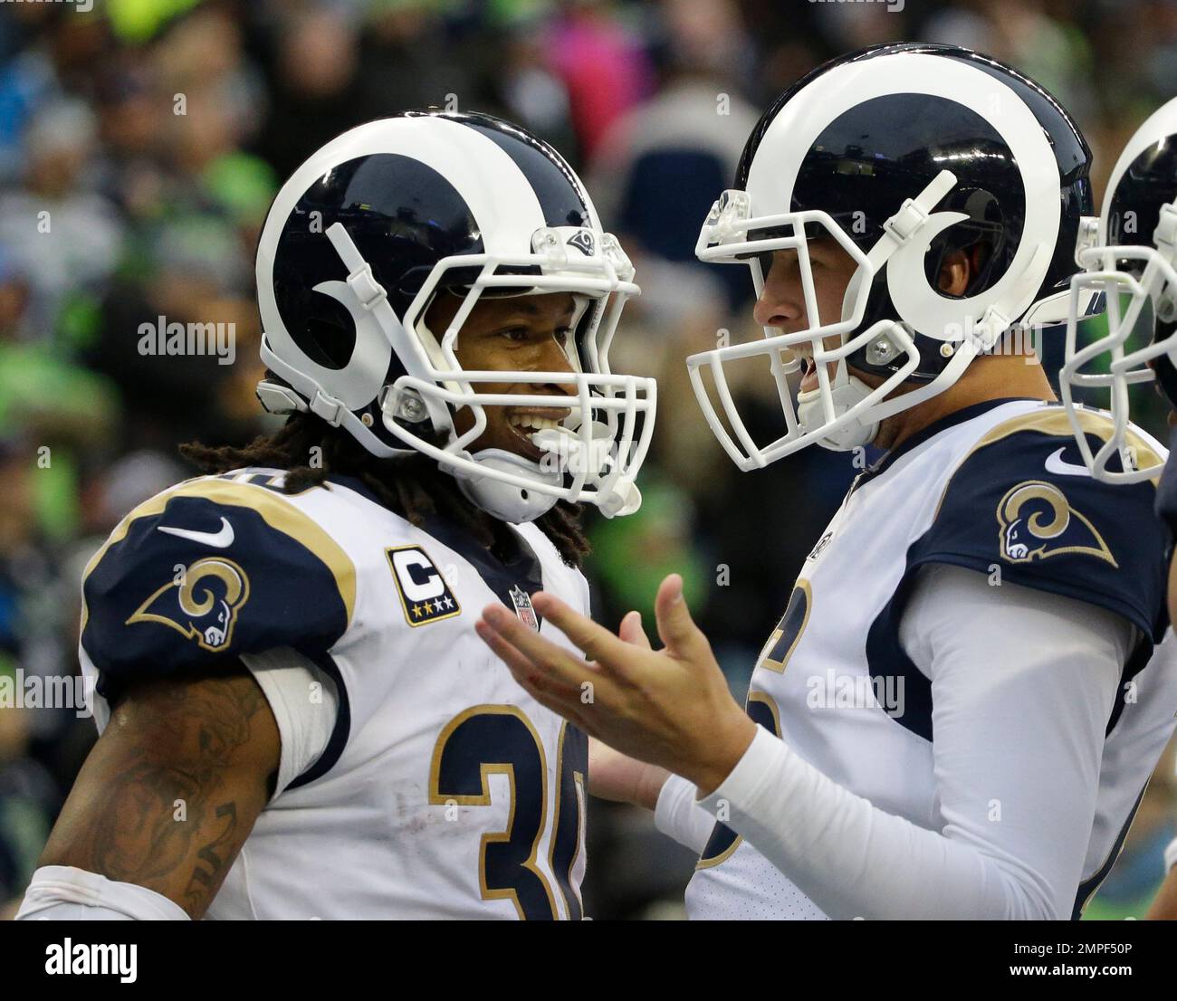 Los Angeles Rams running back Todd Gurley, left, is greeted by ...