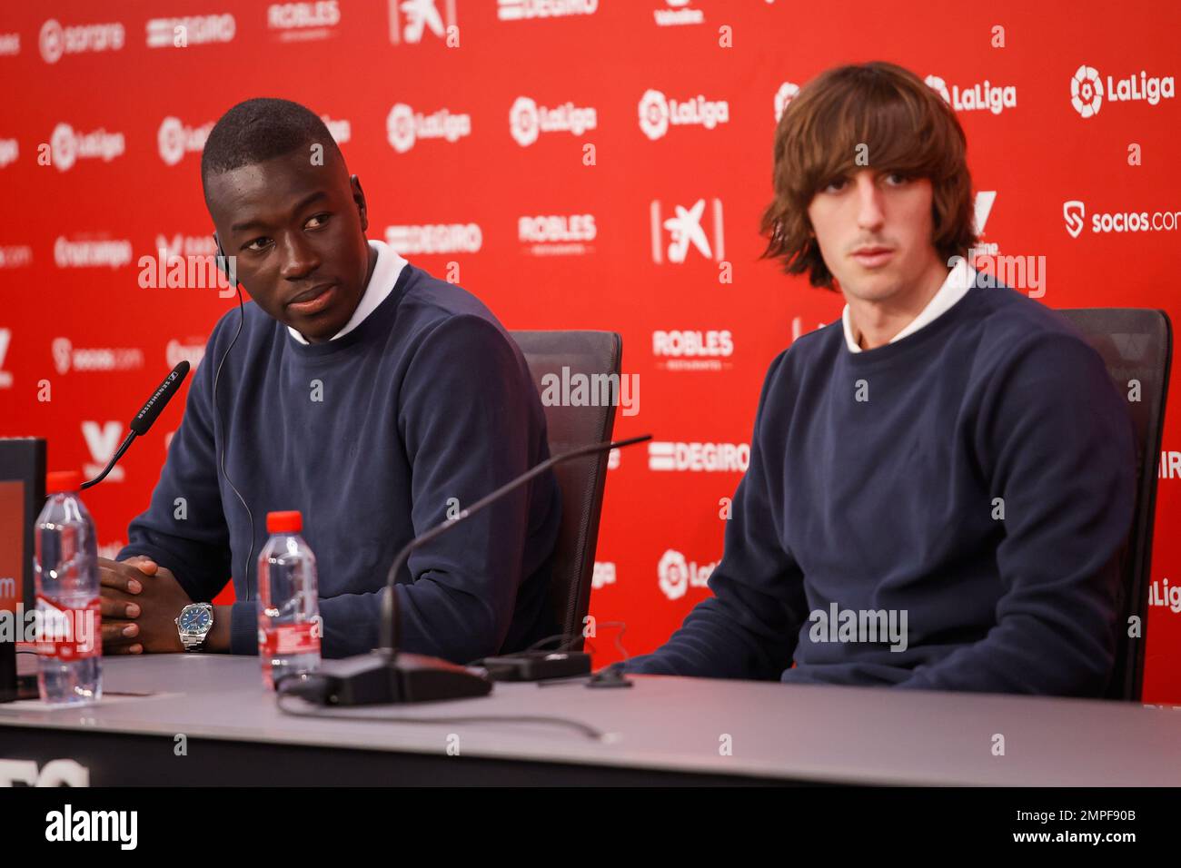Seville, Spain. 31st Jan, 2023. Footballers Bryan Gil (R) and Pape ...
