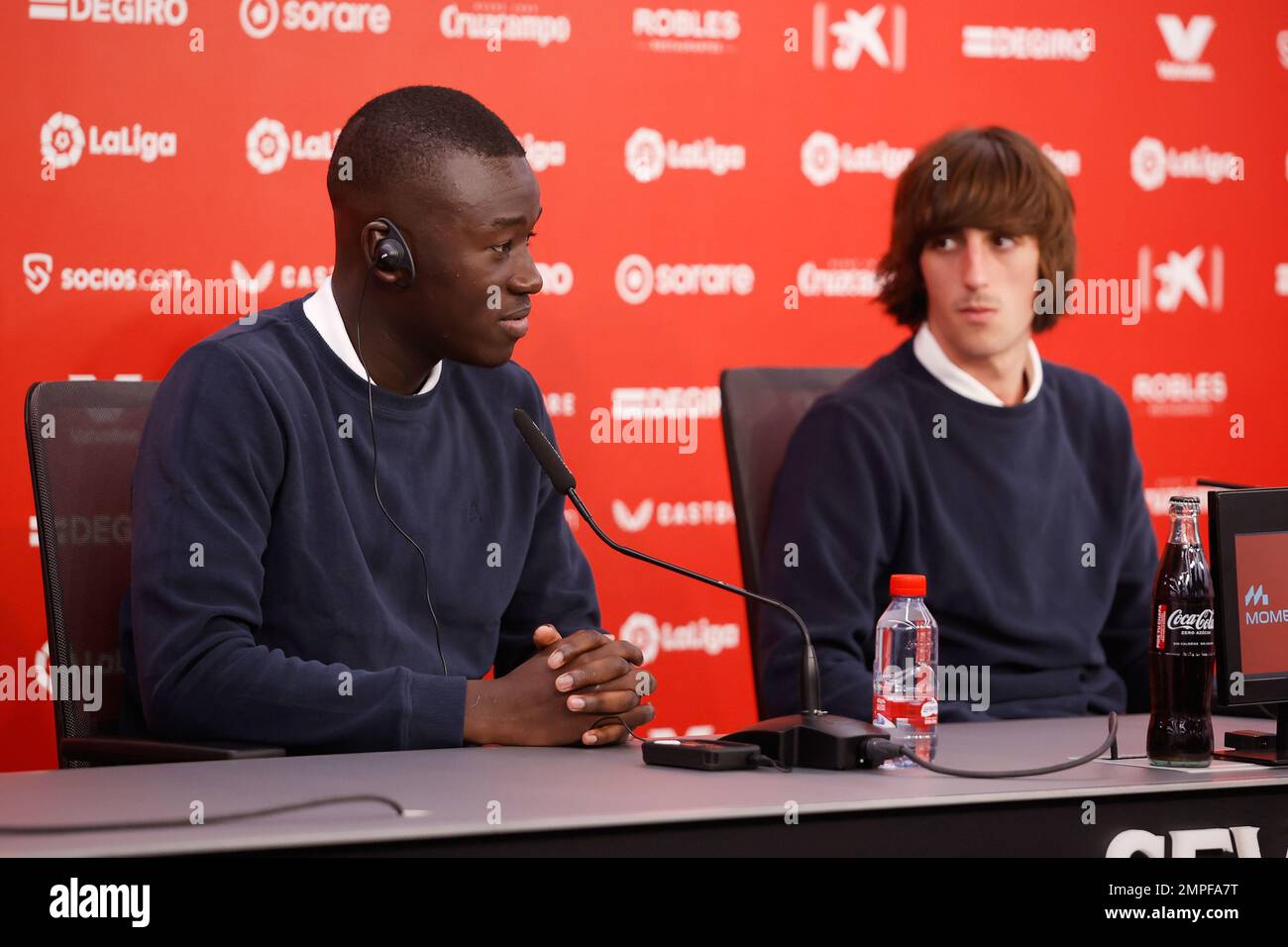 Seville, Spain. 31st Jan, 2023. Footballers Bryan Gil (R) and Pape ...