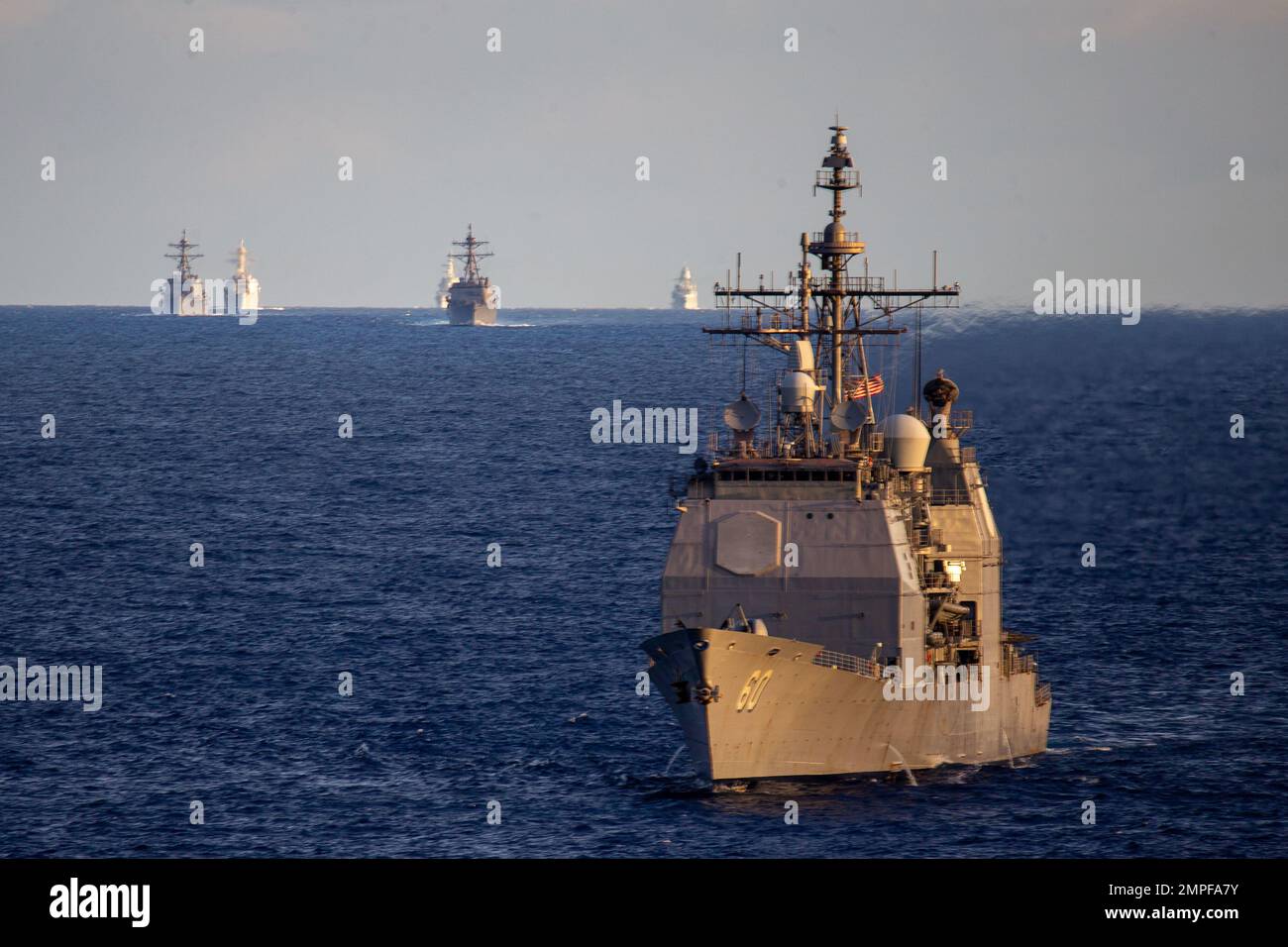 Ticonderoga-class guided missile cruiser USS Normandy (CG 60), and ...