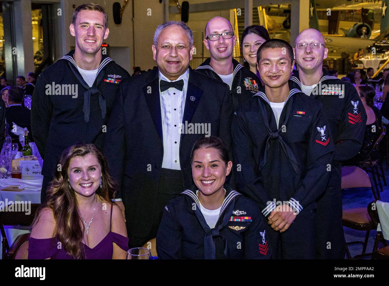 Secretary of the Navy Carlos Del Toro, center, poses for a photograph ...