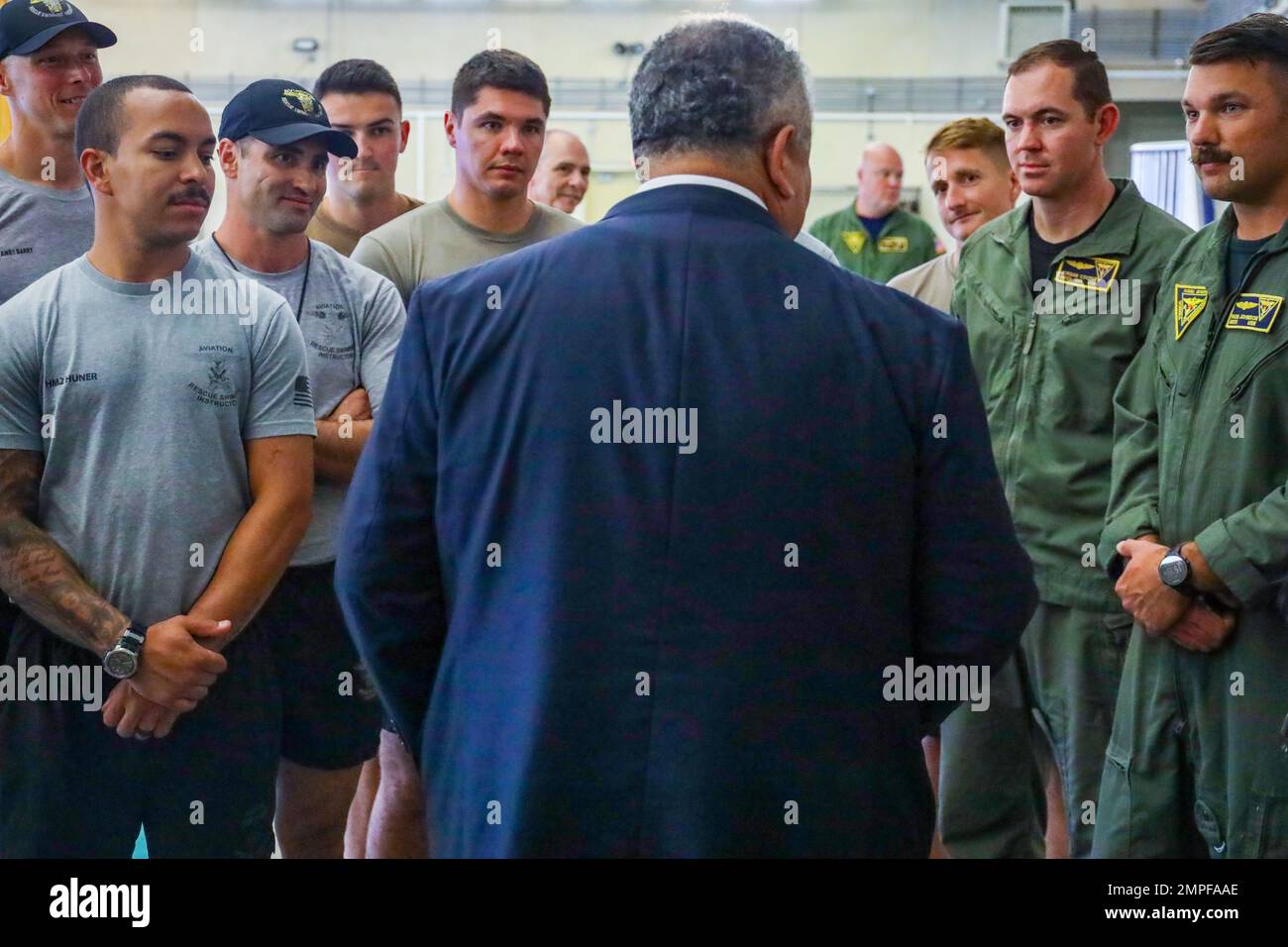 Secretary of the Navy Carlos Del Toro speaks with Sailors during a tour ...