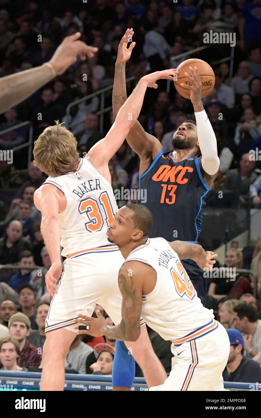 New York Knicks guard Ron Baker (31) blocks a shot by Oklahoma City ...