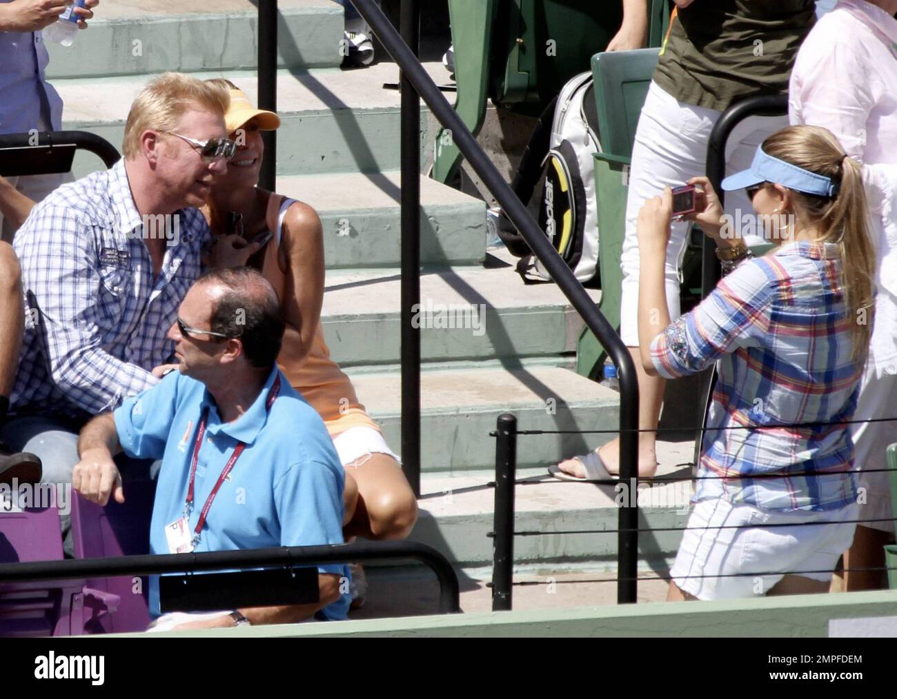 Tennis ace Boris Becker and sons Noah and Elias attend the semifinal tennis match between Andy ...